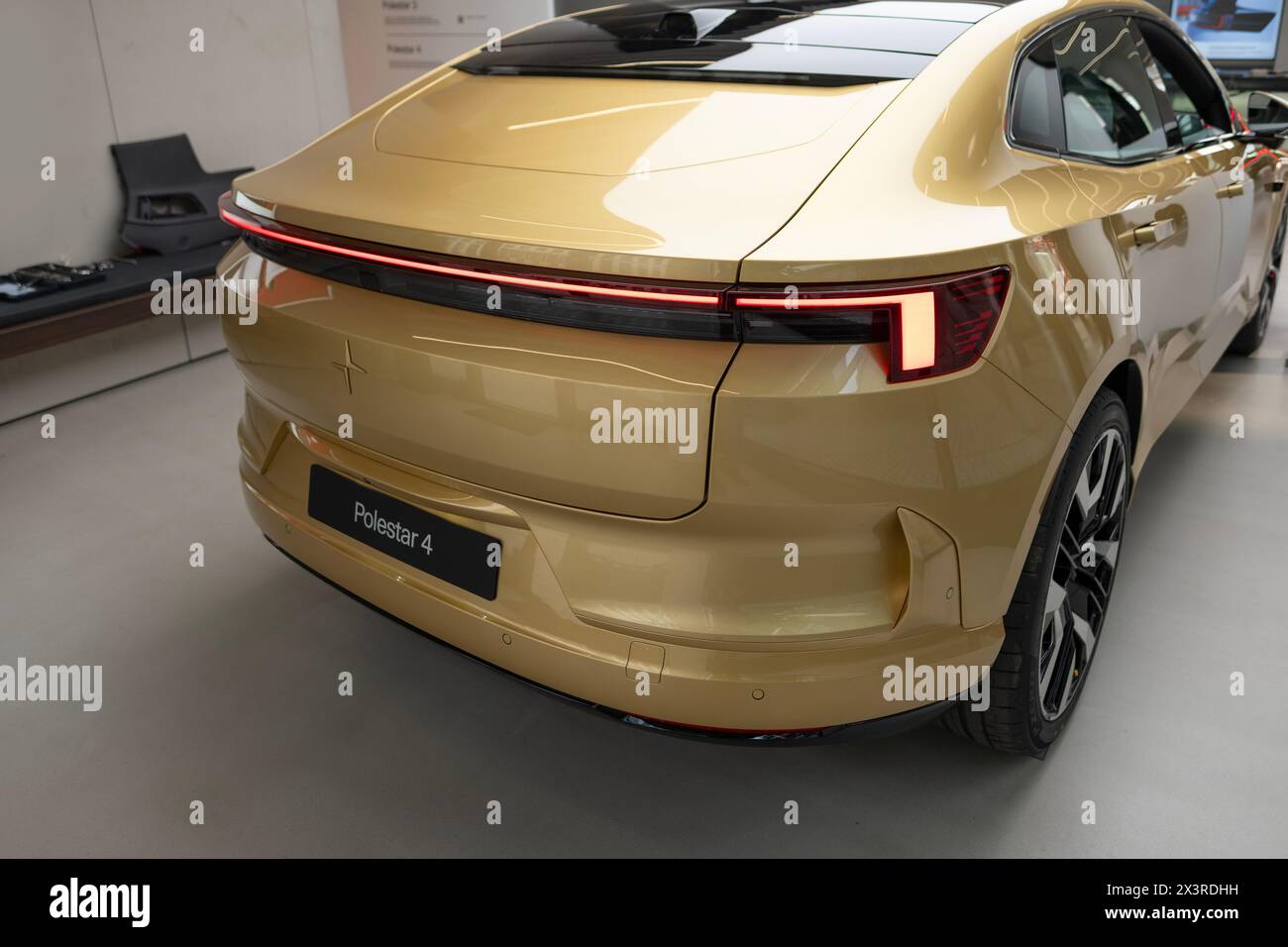 Shiny golden car Polestar 4 upcoming all-electric SUV coupe by Polestar ...