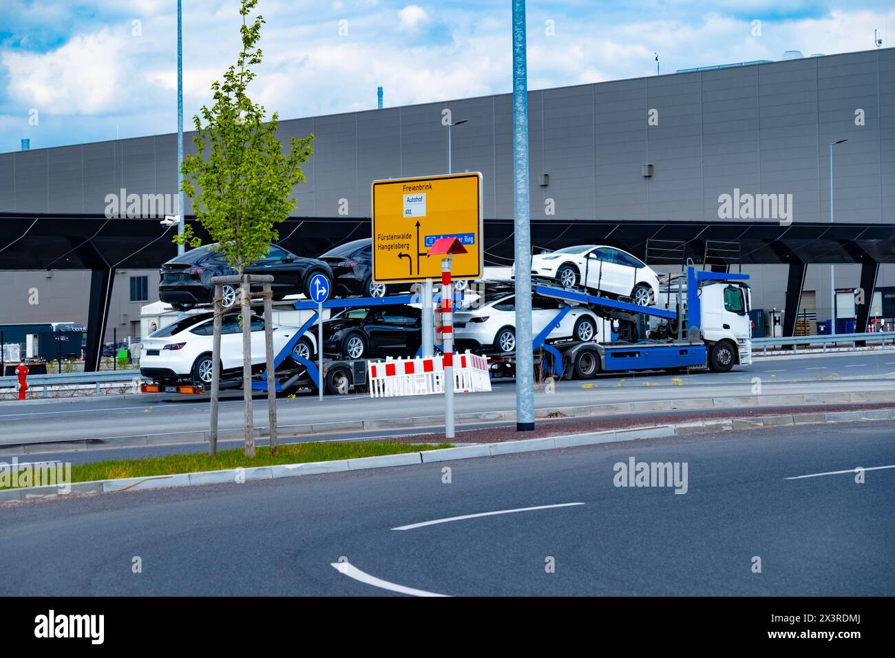 car transporter transports loaded new Tesla vehicles leaving ...