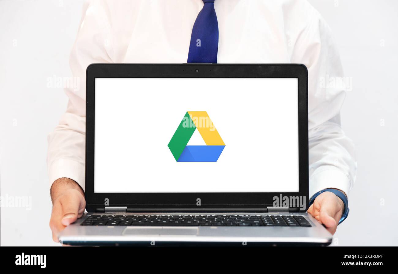 Person Showing Google Drive on Laptop Screen, editorial background ...