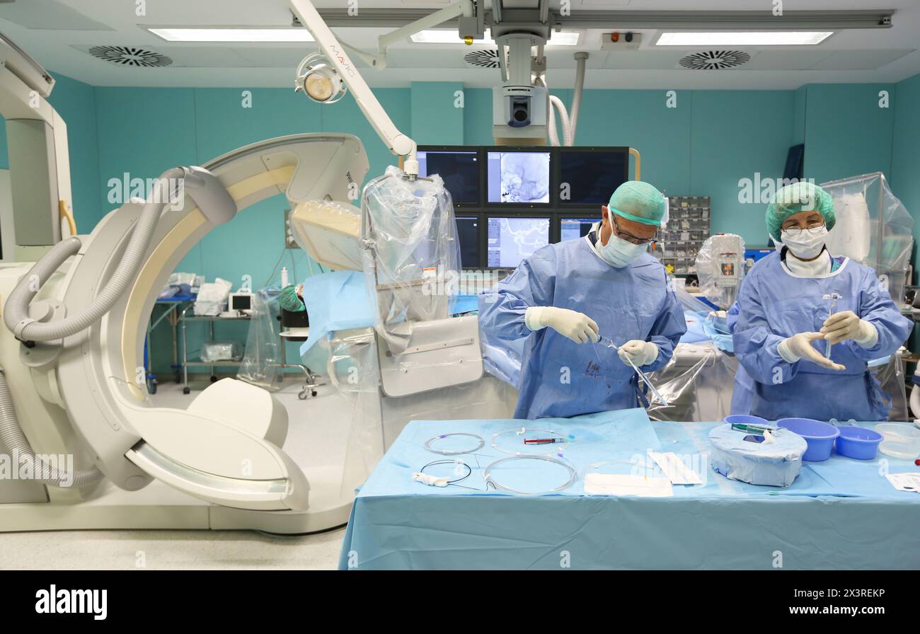 Cerebral aneurysm embolization, angiography system, Interventional ...