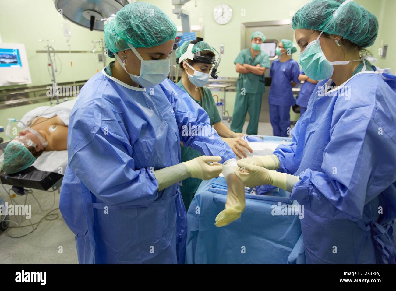 Tonsillectomy, Surgeons performing a tonsillectomy tonsil removal ...