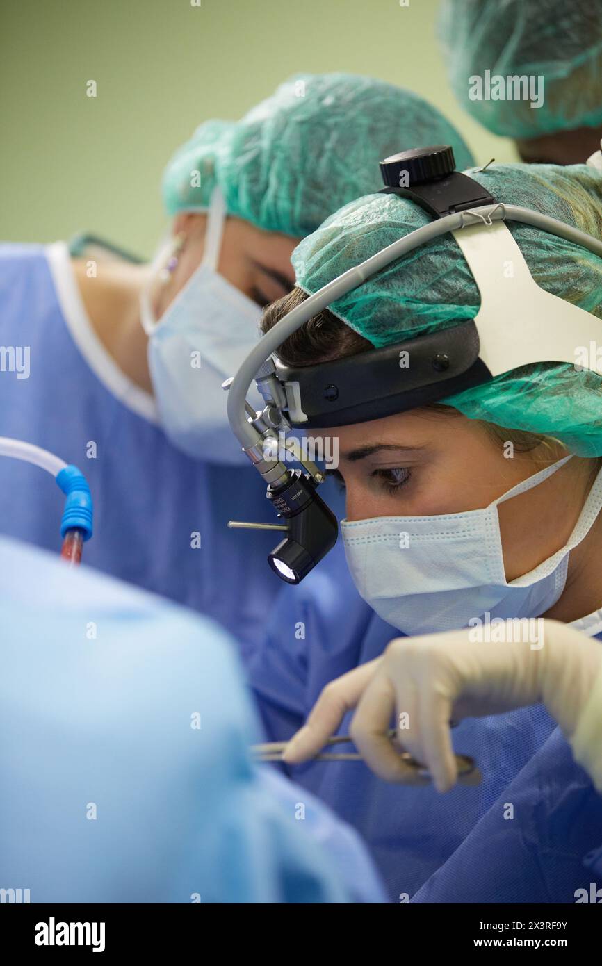 Tonsillectomy, Surgeons performing a tonsillectomy tonsil removal ...