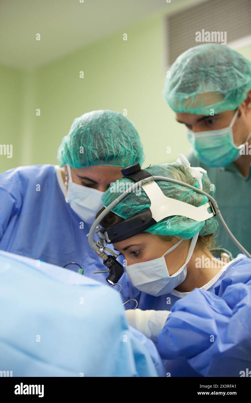 Tonsillectomy, Surgeons performing a tonsillectomy tonsil removal ...