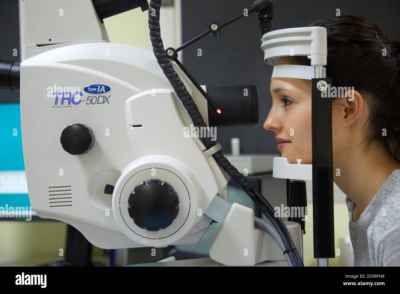 Eye examination Doctor using a retinal camera during an angiography ...