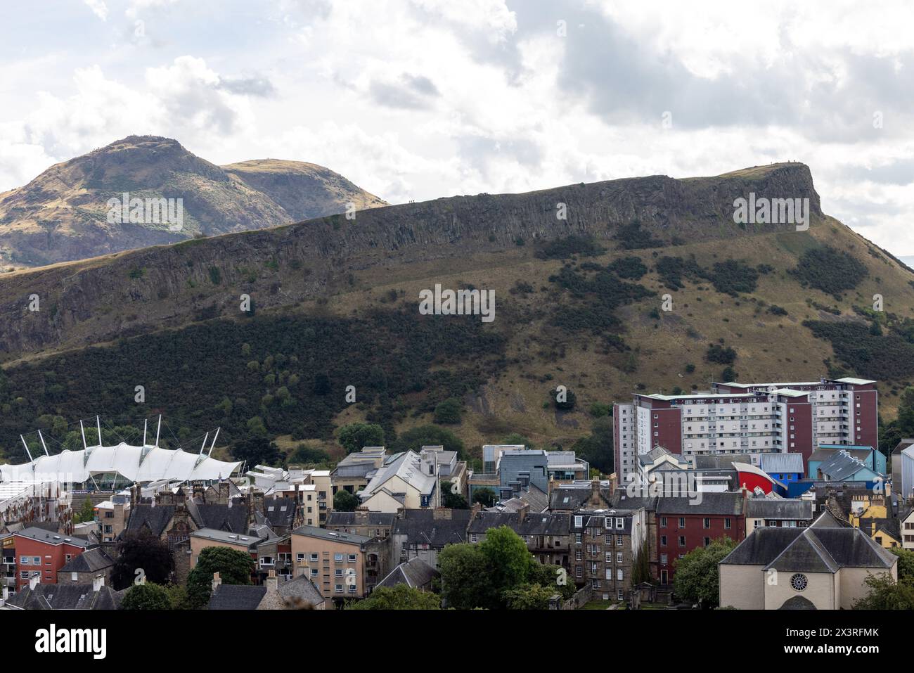 Edinburgh buildings under Arthur's Seat, the extinct volcano that ...