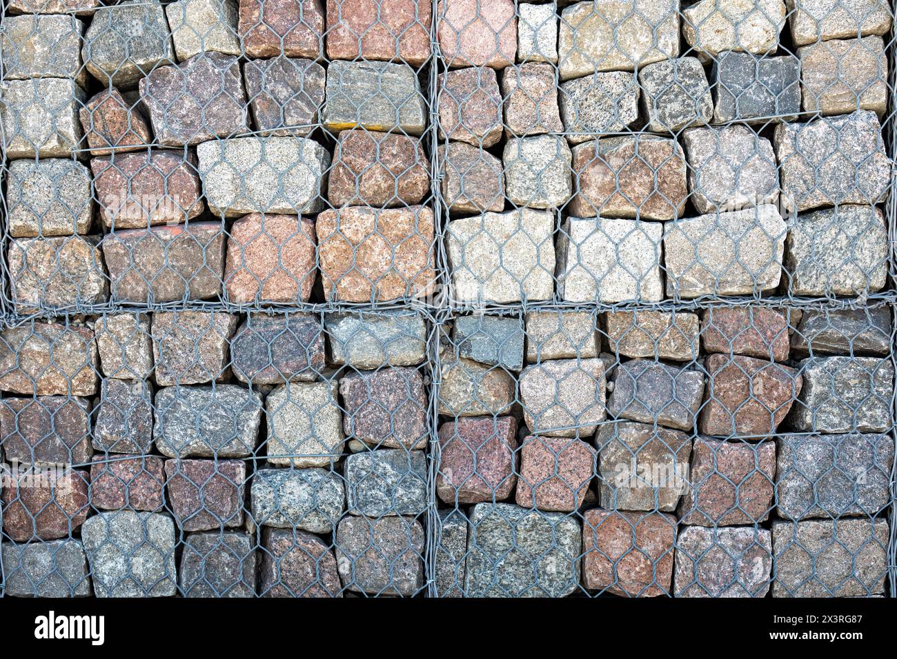 Engineering structure made of stones behind metal wire netting to ...