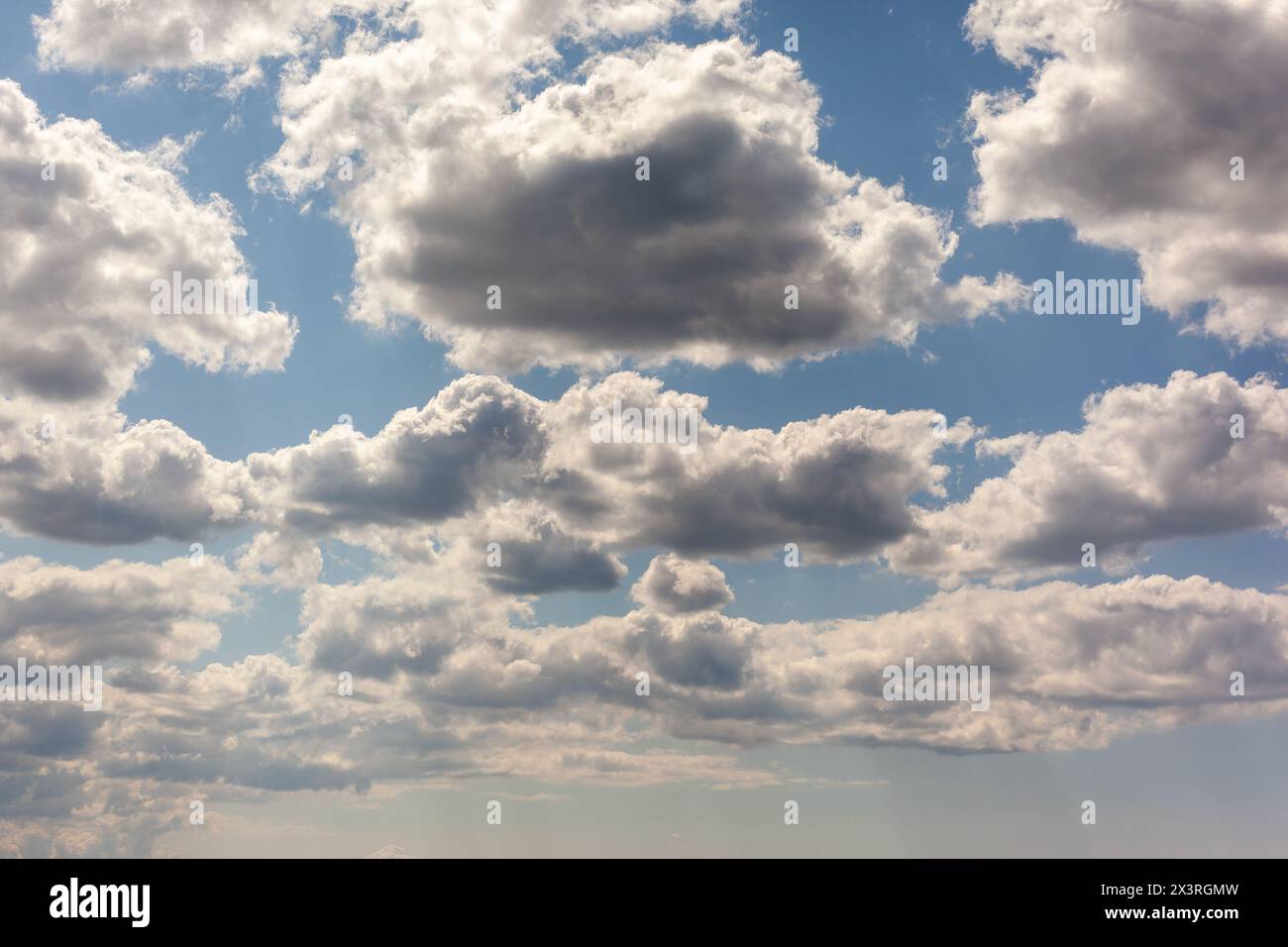 Blue sky background with clouds. Horizontal photo Stock Photo - Alamy