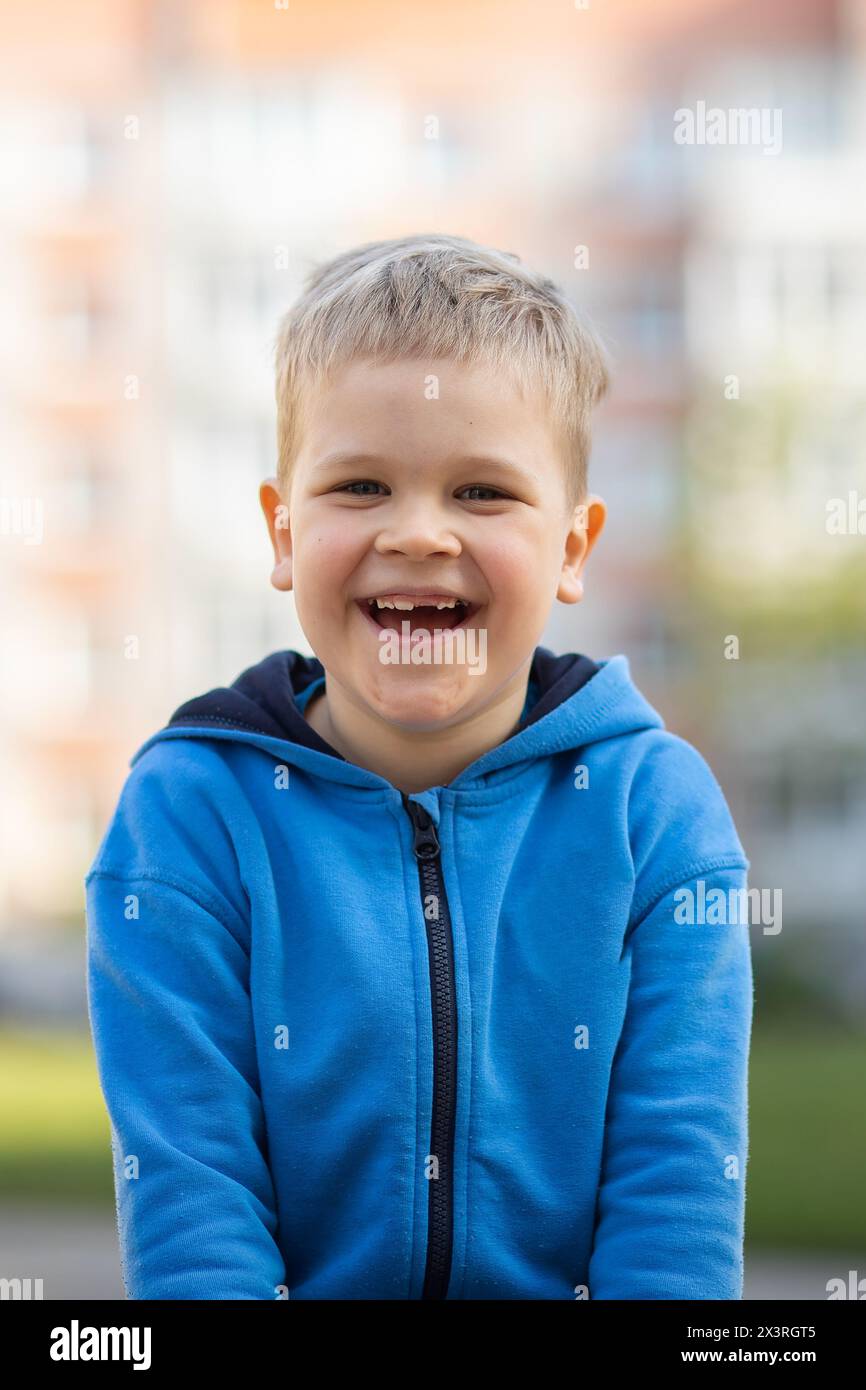 Portrait of a little smiling boy no tooth. Cute Caucasian happy smiling child showing missing ...