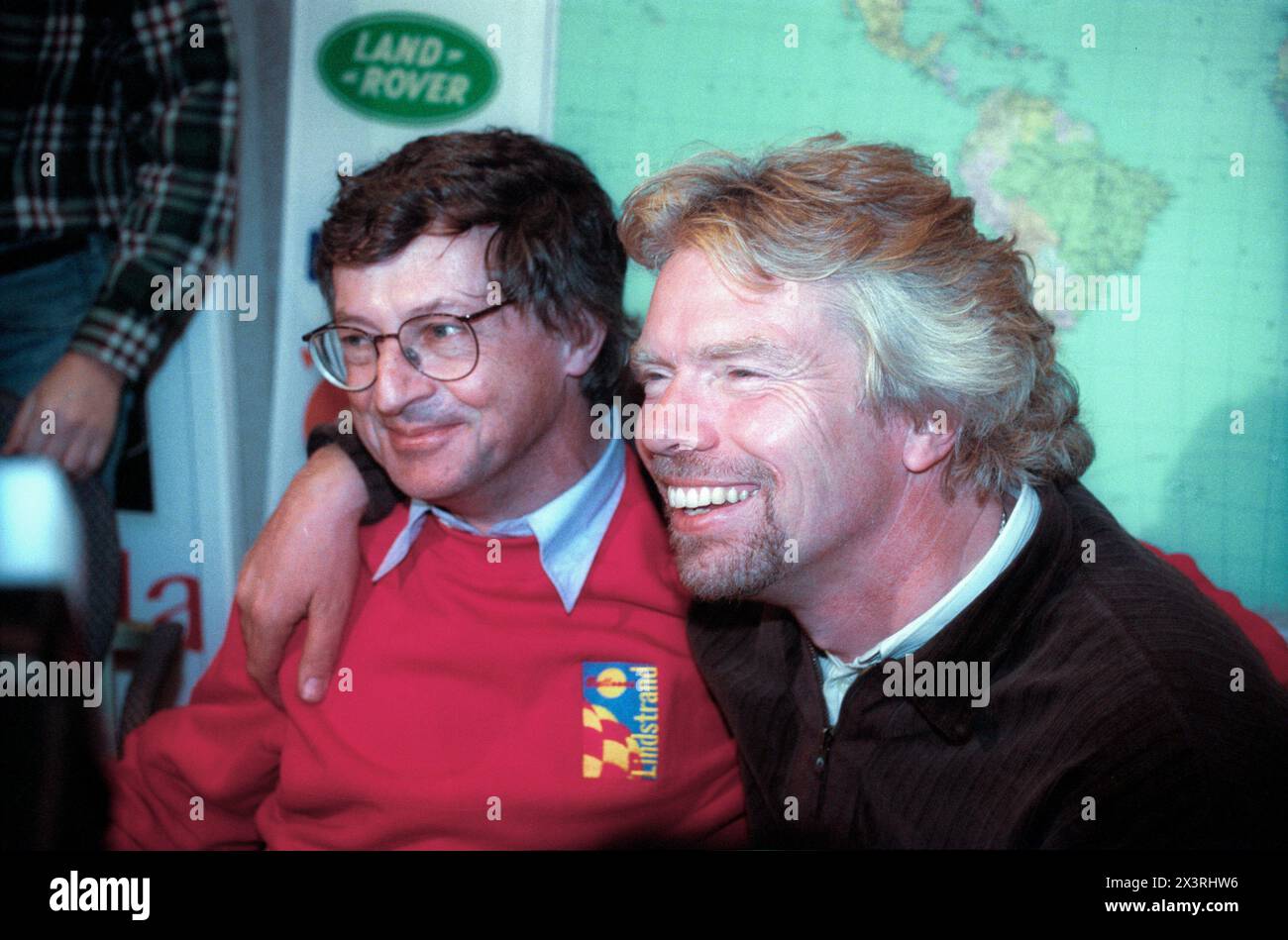 Richard Branson gives a news conference in London with fellow crew ...