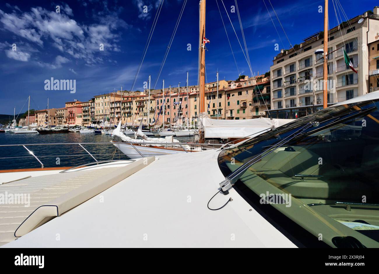 Italy, Tuscany, Elba Island, view of luxury yachts in Portoferraio port ...