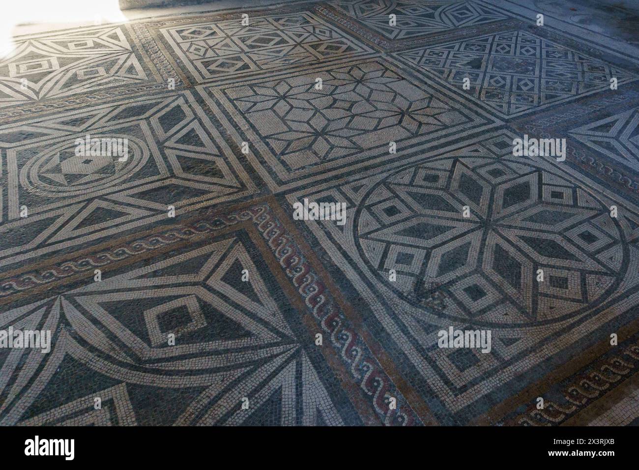 Floor with mosaic inside a ancient roman building at the ruins of ...