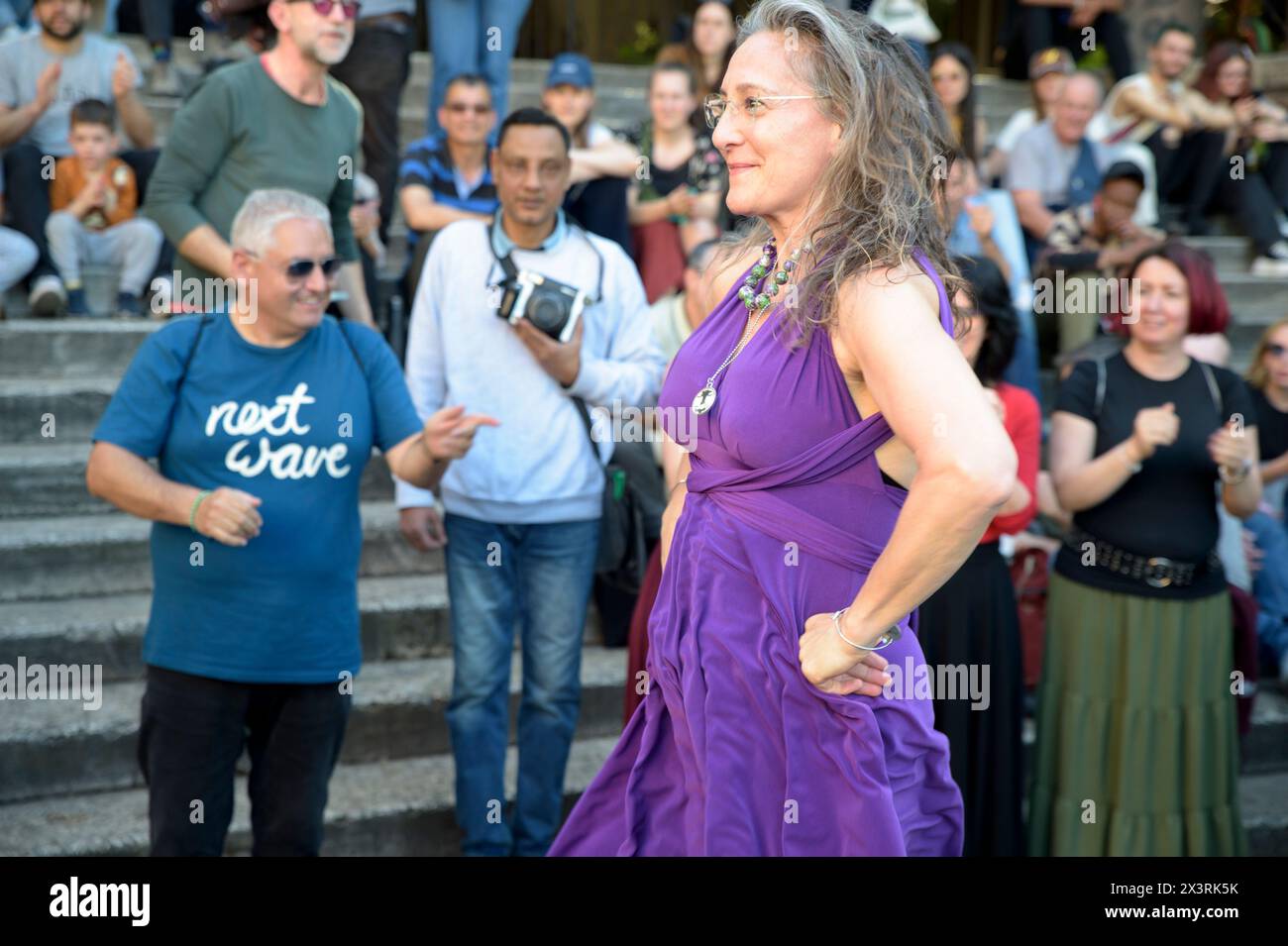 Rome, Italy. 28th Apr, 2024. A woman dances during the 'Dance for peace' flash mob organized by ...