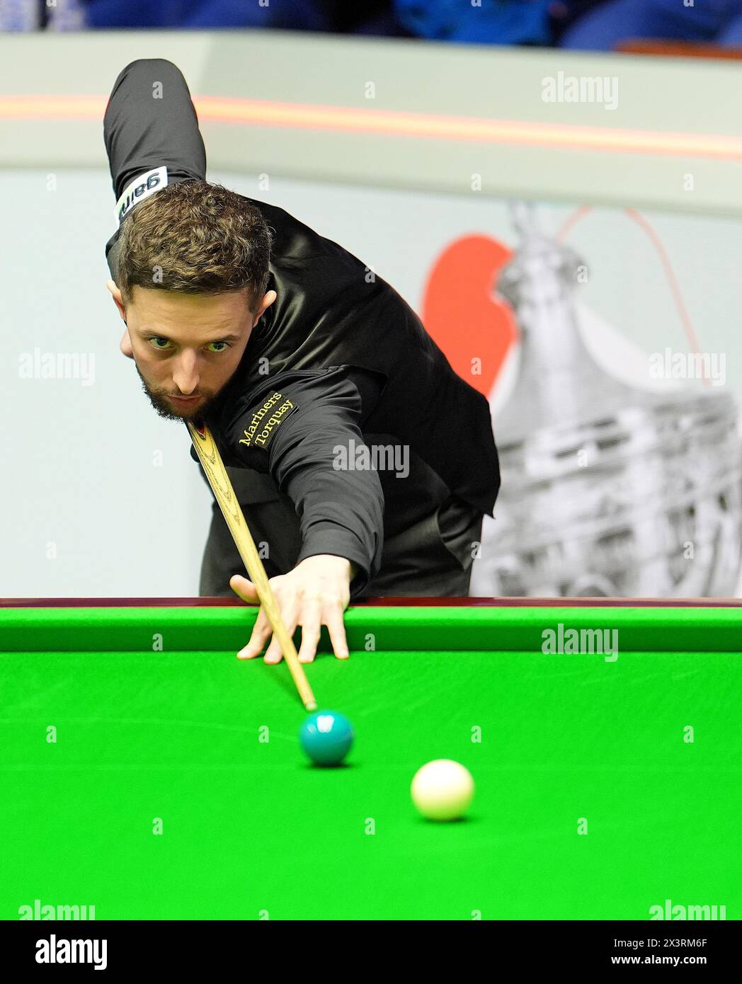 Joe O'Connor plays a shot during his match with Kyren Wilson, on day ...