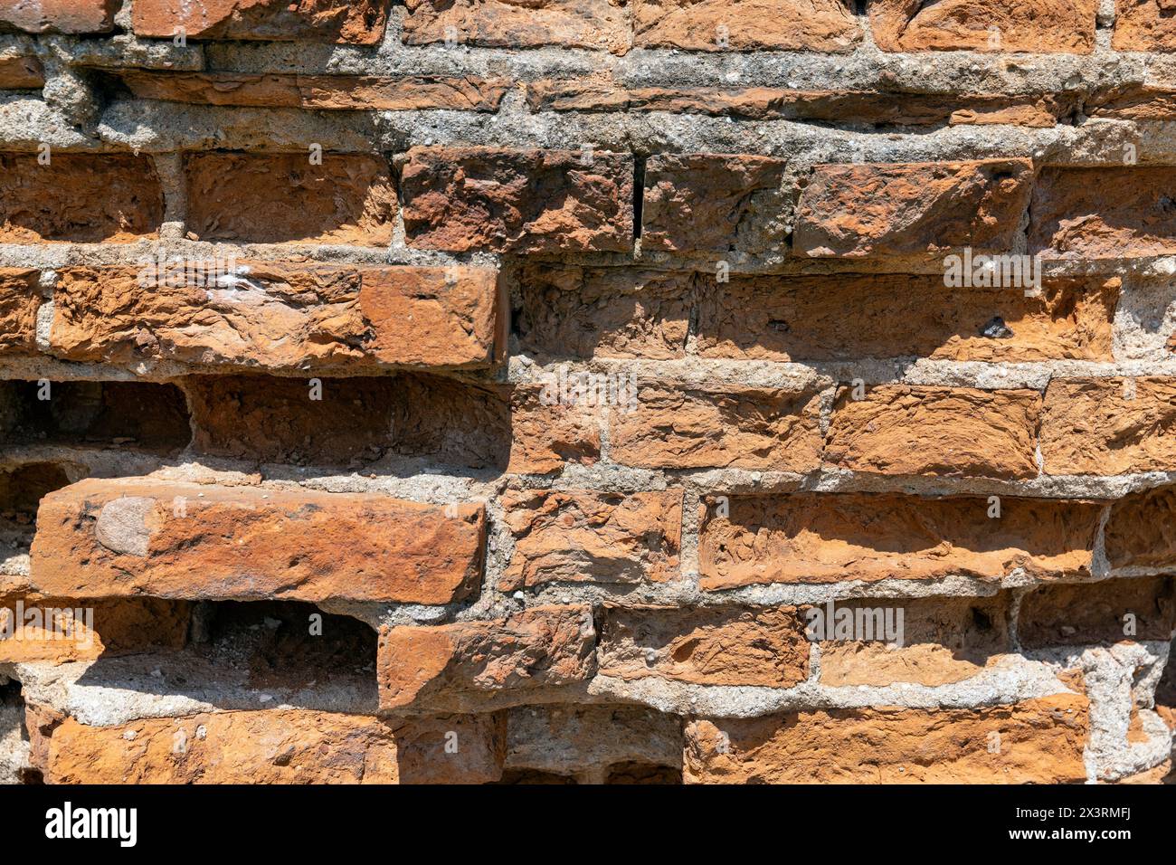 red brick ruins , damaged red bricks from the wall of an ancient ...