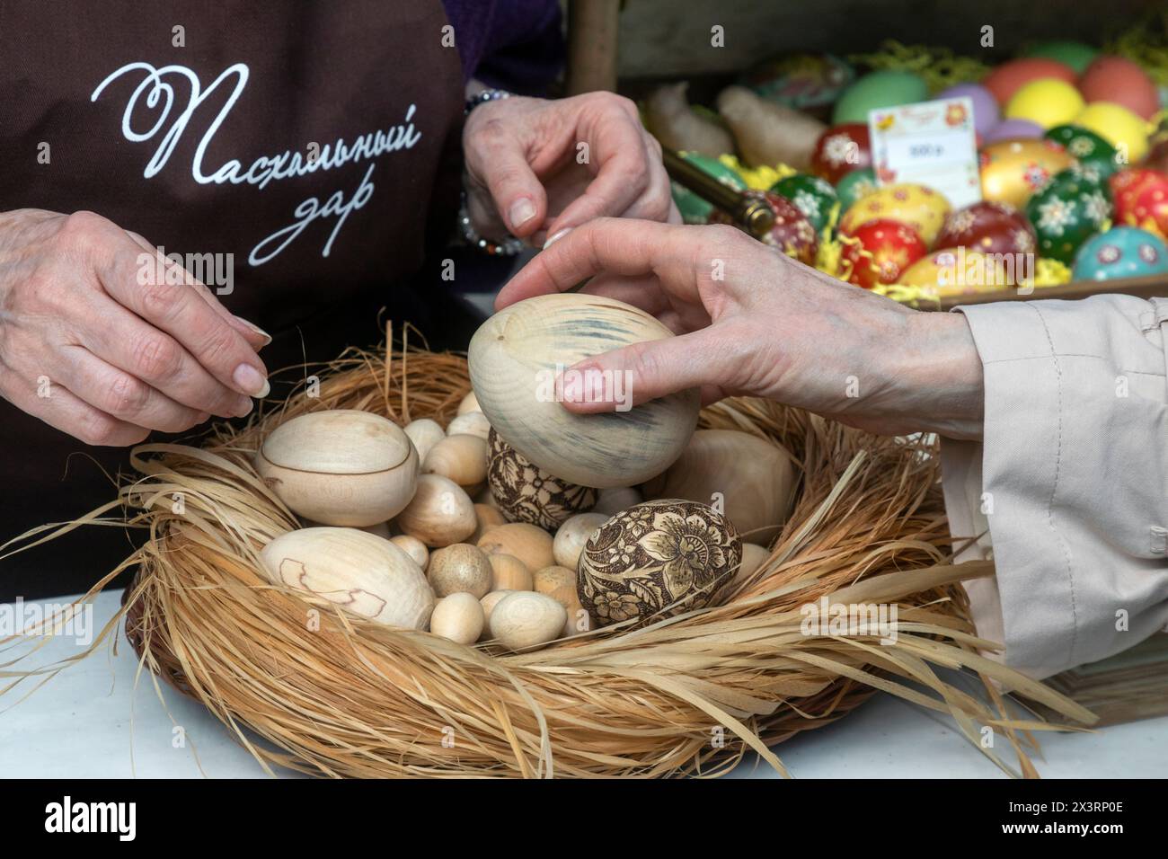 Moscow, Russia. 28th of April, 2024. A woman sells Easter decorated ...