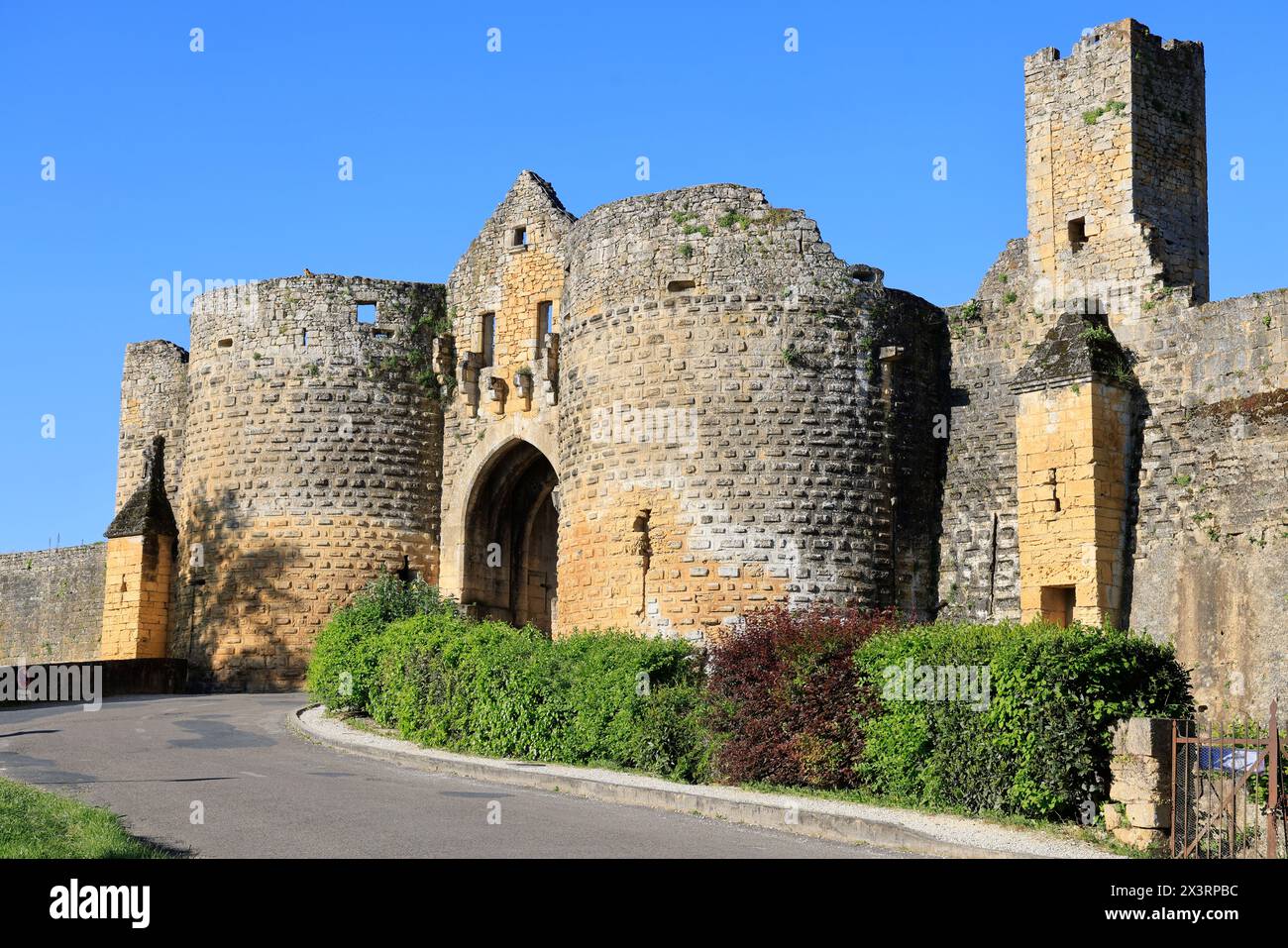The Porte des Tours in the ramparts of the bastide of Domme founded in ...