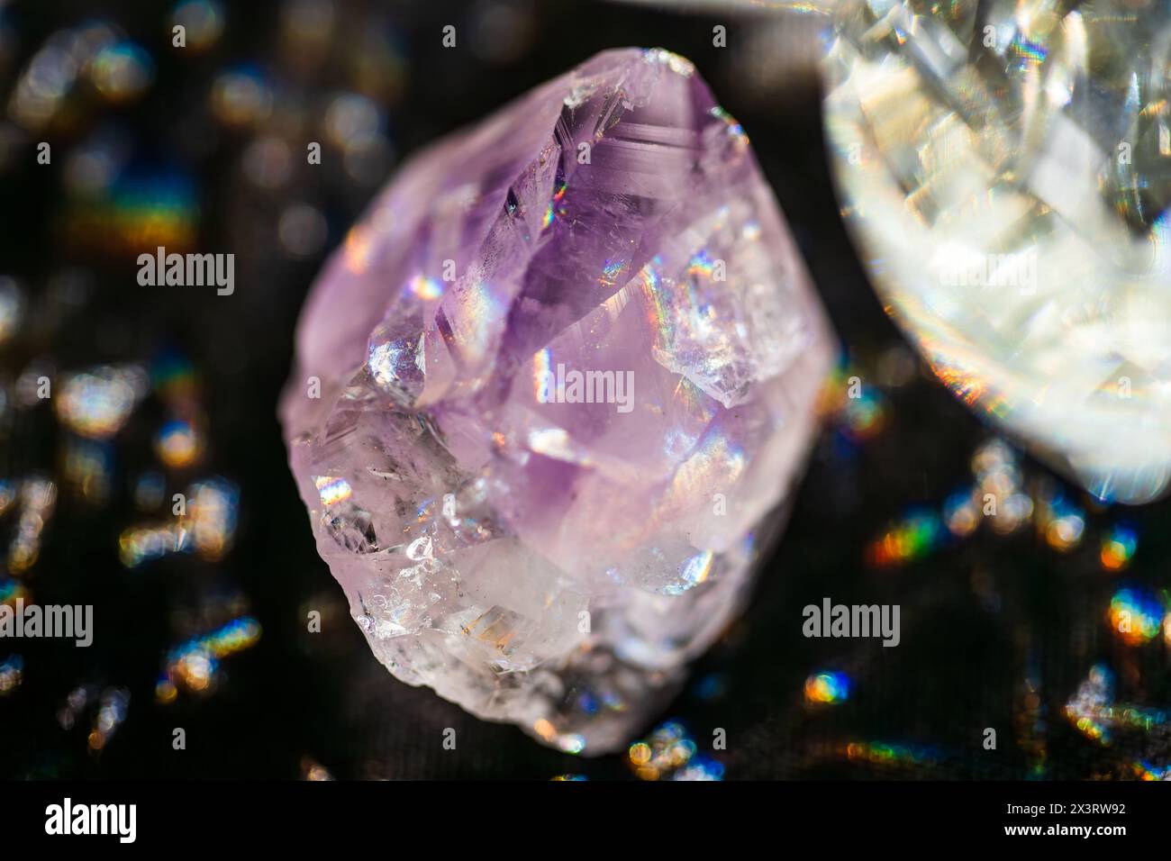amethyst crystal with sparkling prism light Stock Photo - Alamy