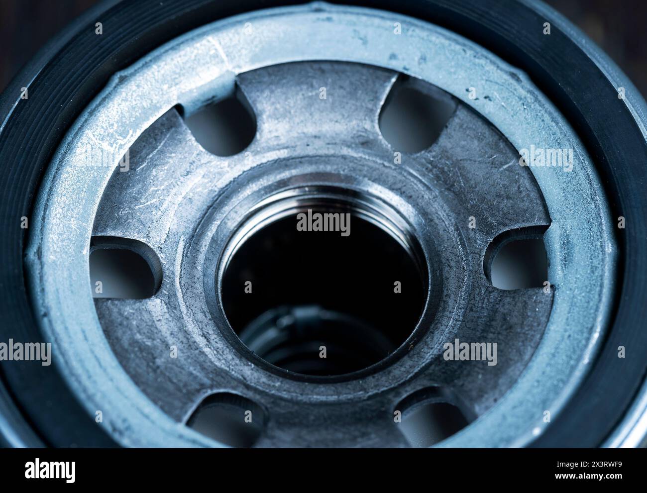 new oil filter for cleaning the oil in the car engine, a close-up of ...