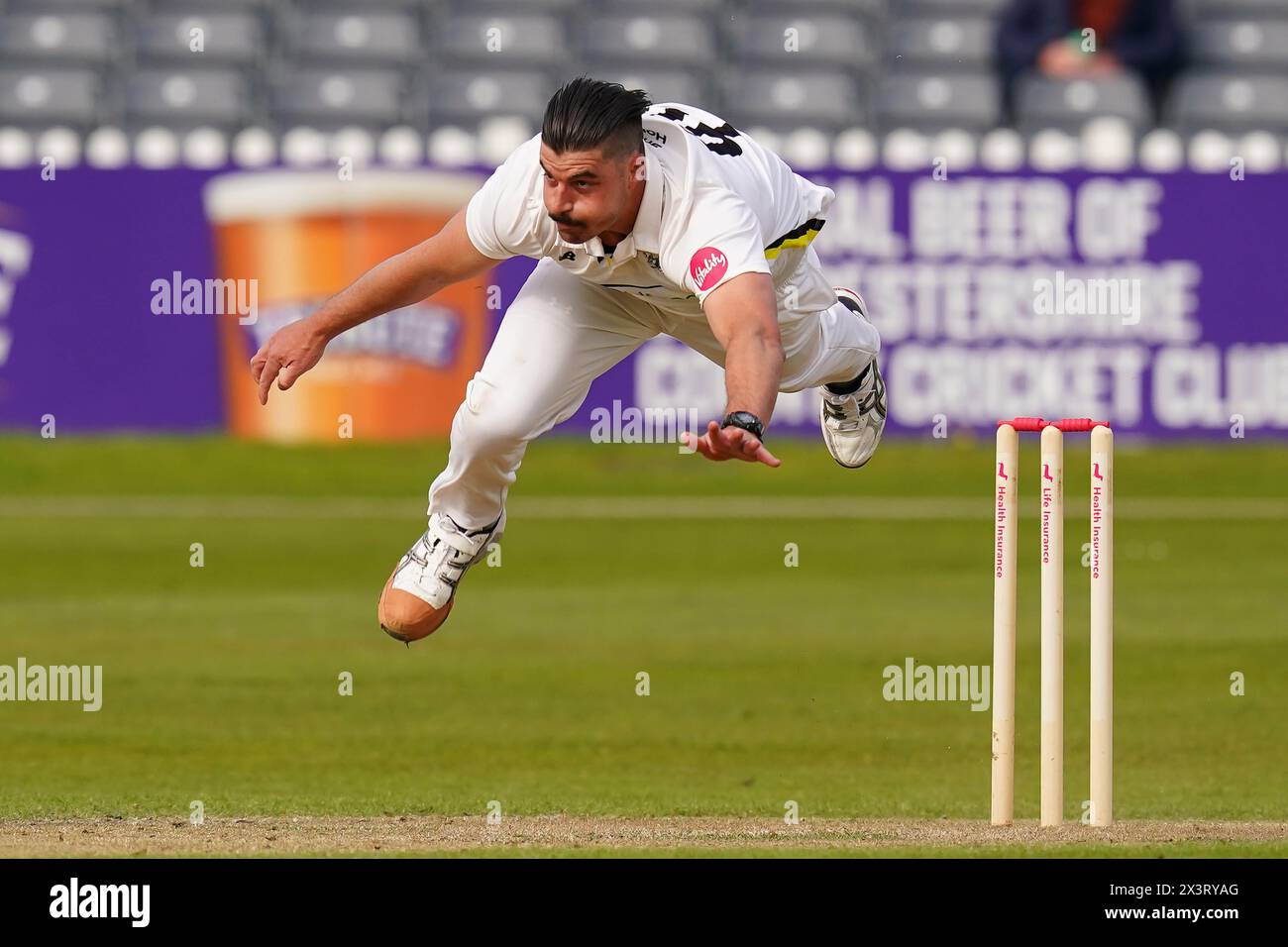 Bristol, UK, 28 April 2024. Gloucestershire's Marchant de Lange bowling ...