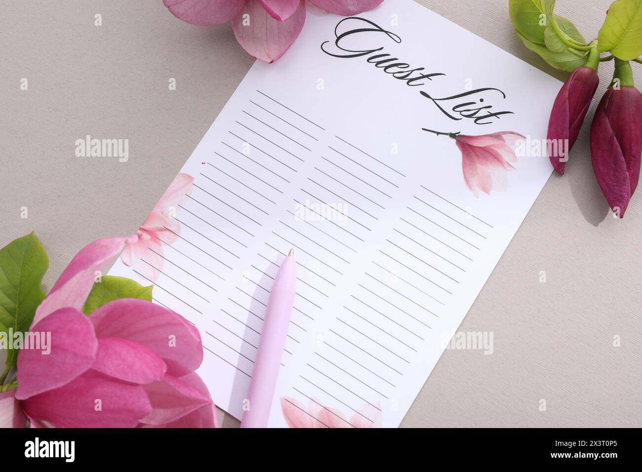 Guest list and beautiful flowers on grey background, flat lay. Space ...