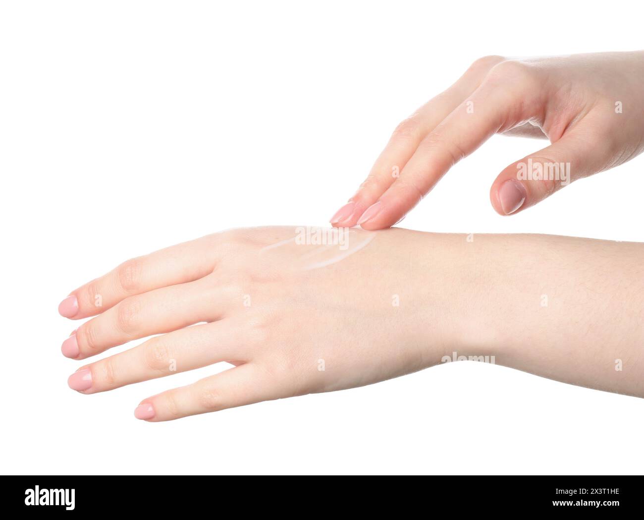 Woman applying cream on her hand against white background, closeup ...