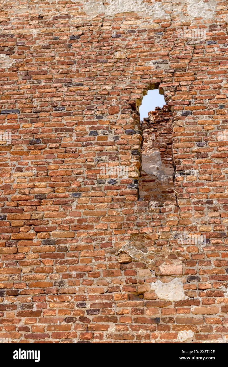 red brick ruins , damaged red bricks from the wall of an ancient ...