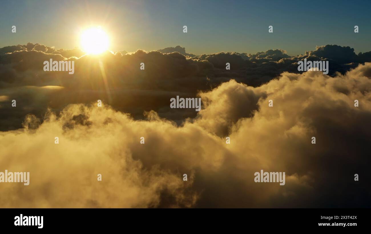 Aerial view of clouds and morning sun Stock Photo - Alamy
