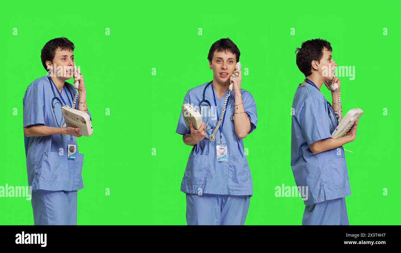 Nurse answering landline phone call to make checkup appointments ...