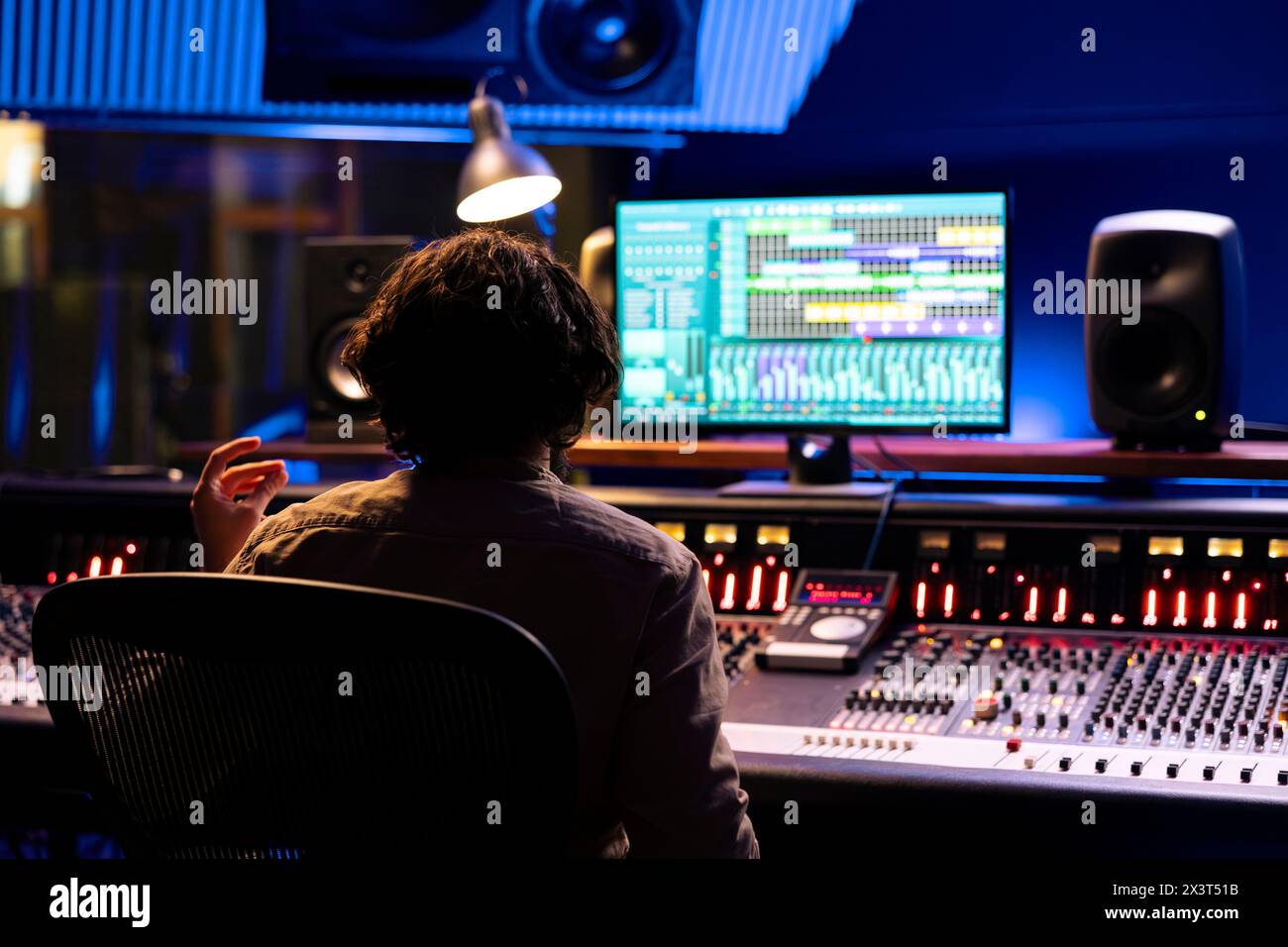 Audio expert working on editing music with daw software interface ...