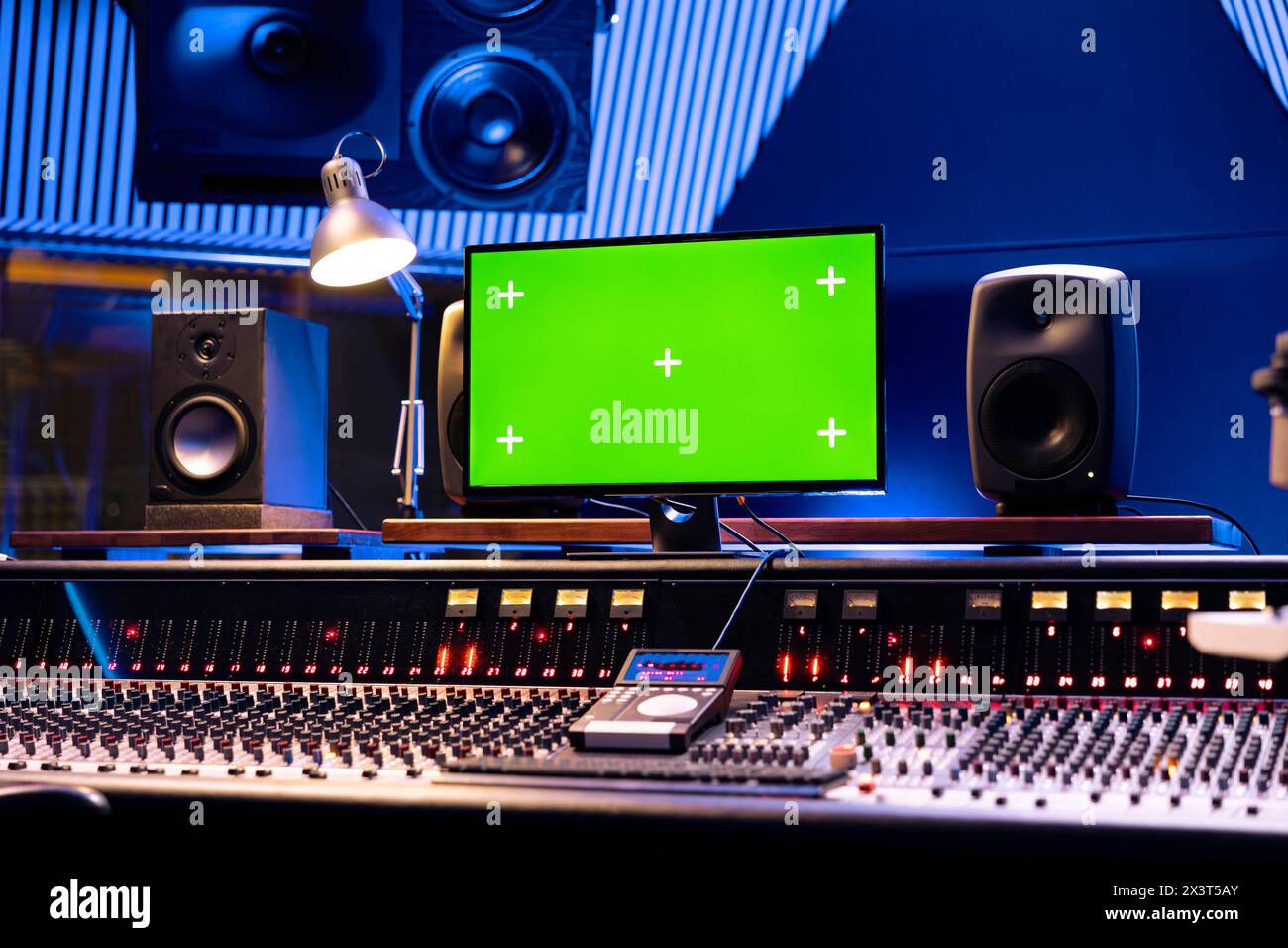 Empty control room with greenscreen on monitor and panel board ...