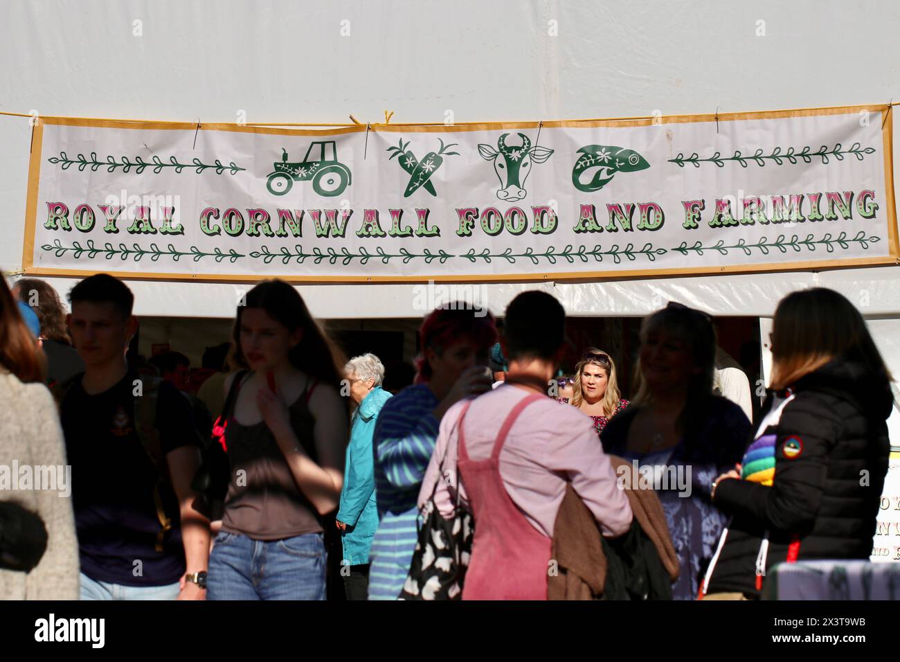 Crowds gather at the busy Royal Cornwall Food and Farming tent at the ...