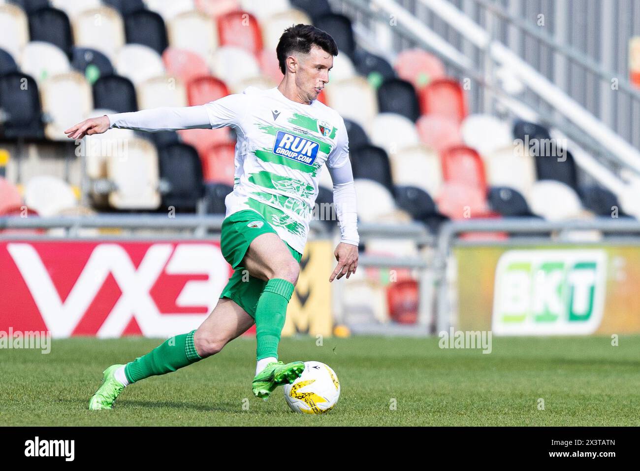 Newport, UK. 28th Apr, 2024. Rory Holden of TNS in action. Connahs Quay ...