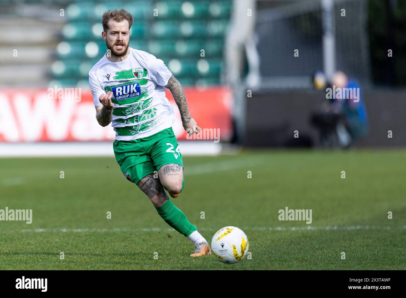 Newport, UK. 28th Apr, 2024. Ash Baker of TNS in action. Connahs Quay v ...