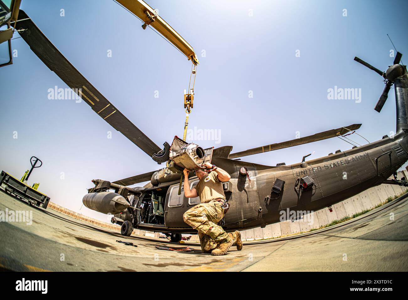 U.S. Army Staff Sgt. David Martin of 2-82, 82nd Combat Aviation Brigade ...