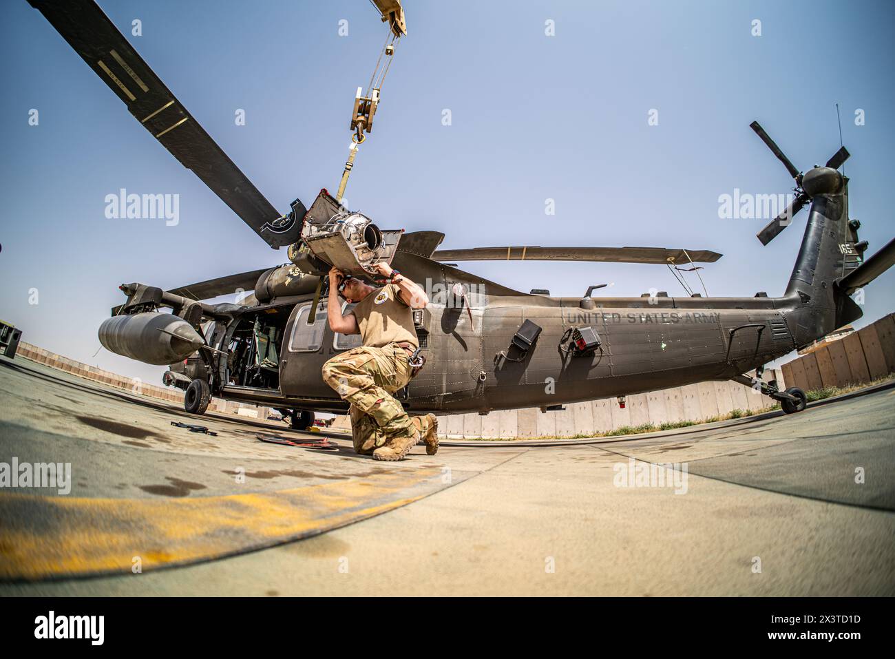 U.S. Army Staff Sgt. David Martin of 2-82, 82nd Combat Aviation Brigade ...