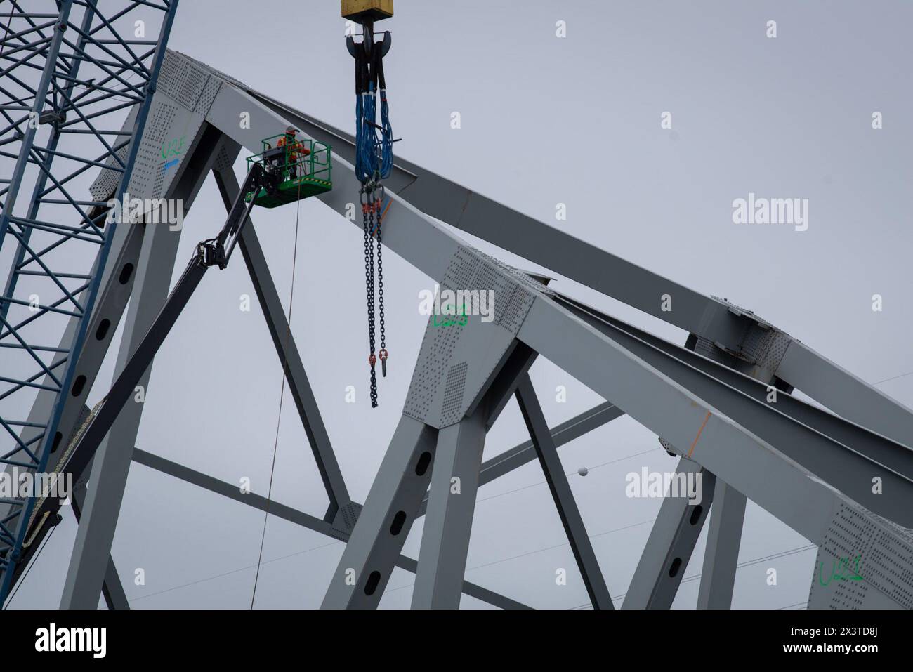 A salvor with the Unified Command approaches the wreckage from the ...