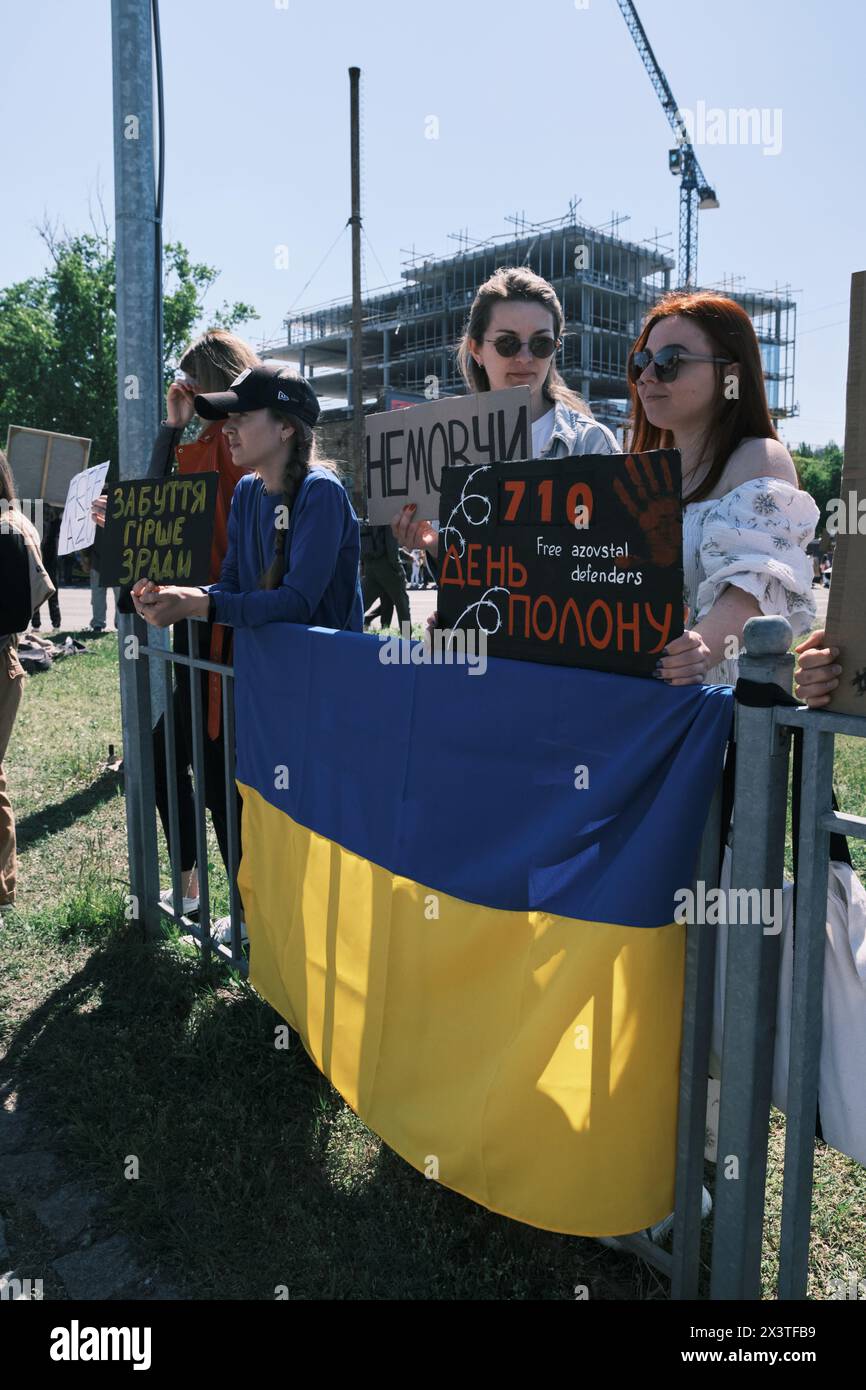 Kyiv, Ukraine - 28 April, 2024. Ukrainian protestors proudly wave Azov ...