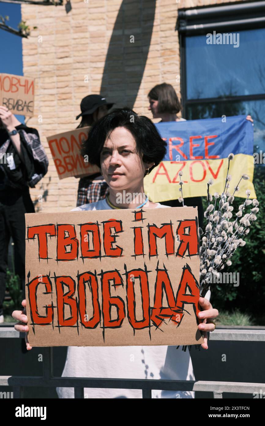 Kyiv, Ukraine - 28 April, 2024. Ukrainian protestors proudly wave Azov ...
