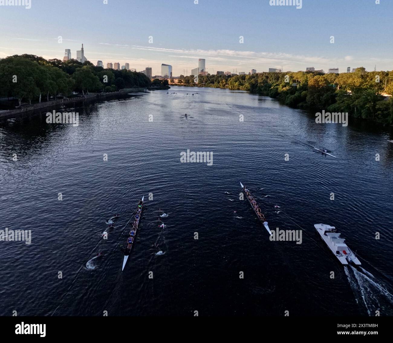 Rowers head north along the Schuylkill River with the Philadelphia ...