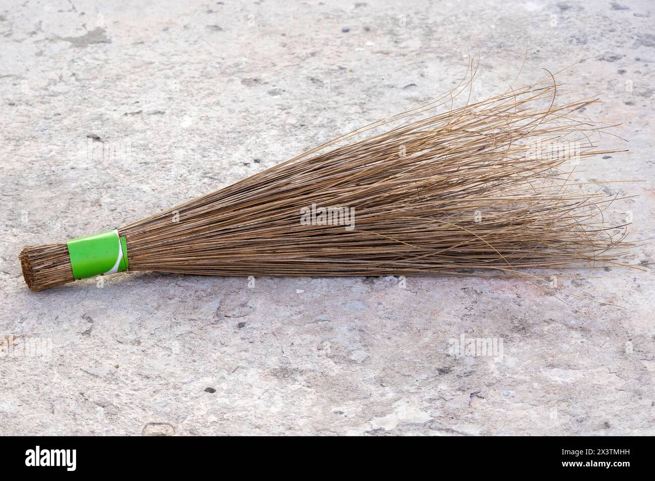 Coconut leaf stick broom. It is a traditional broom that is widely used ...