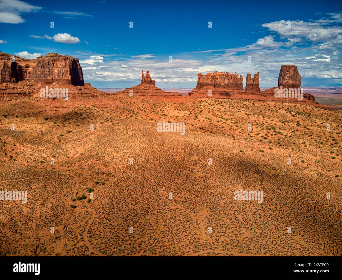 Barren desert landscape showcasing dry terrain with scattered rocks ...