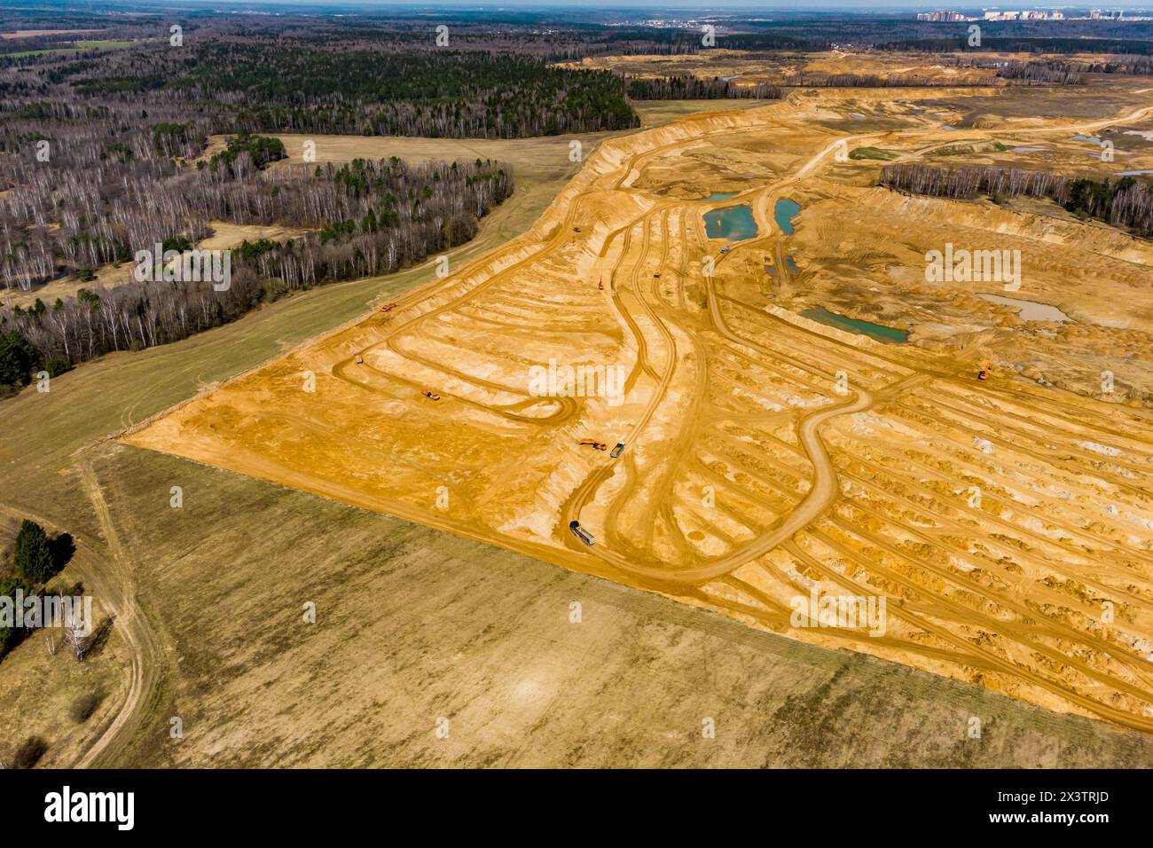 Top view of the edge of an active sand quarry, extraction of ...