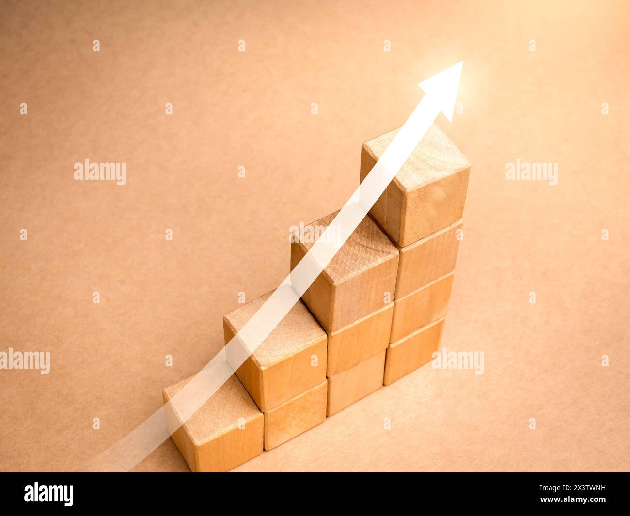 Shining rise up arrow on wooden cube blocks, bar graph chart steps on beige background, profit ...