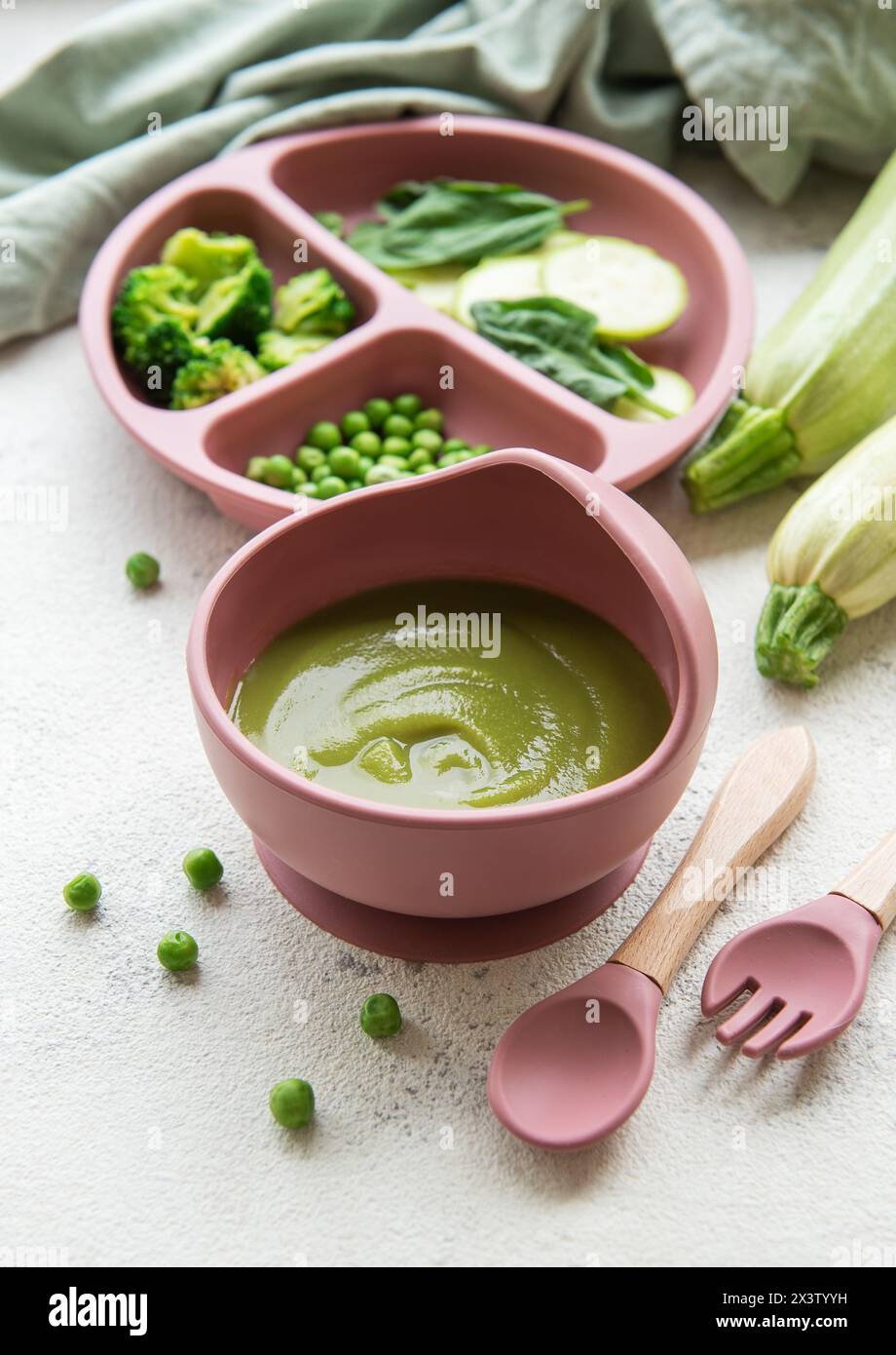 Healthy baby food in bowl. Baby food vegetable puree with broccoli and ...