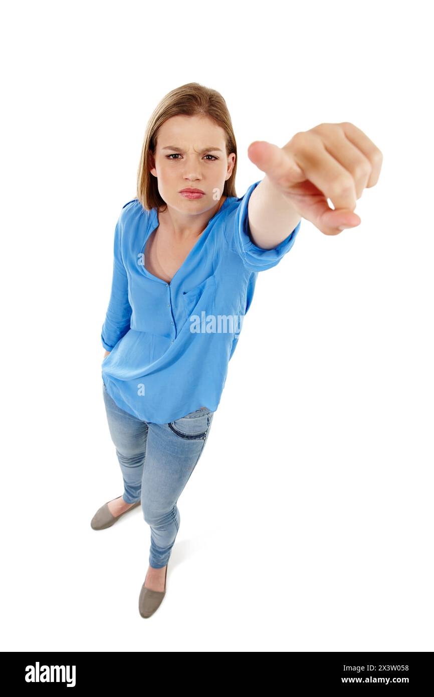 Woman, pointing and serious in studio with look in portrait ...