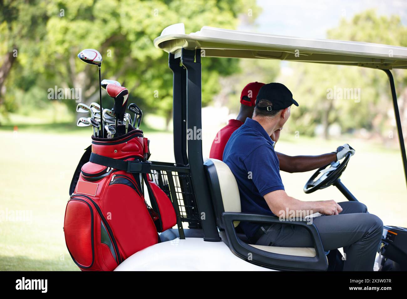 Men, golf cart and driving on lawn for workout with sunshine ...