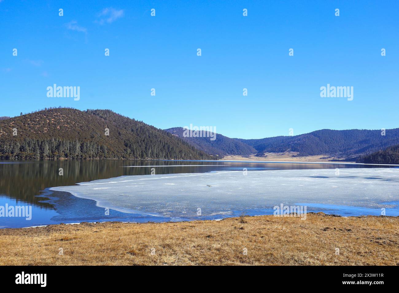 Beautiful landscape with the partially frozen Shudu Lake in Potatso ...