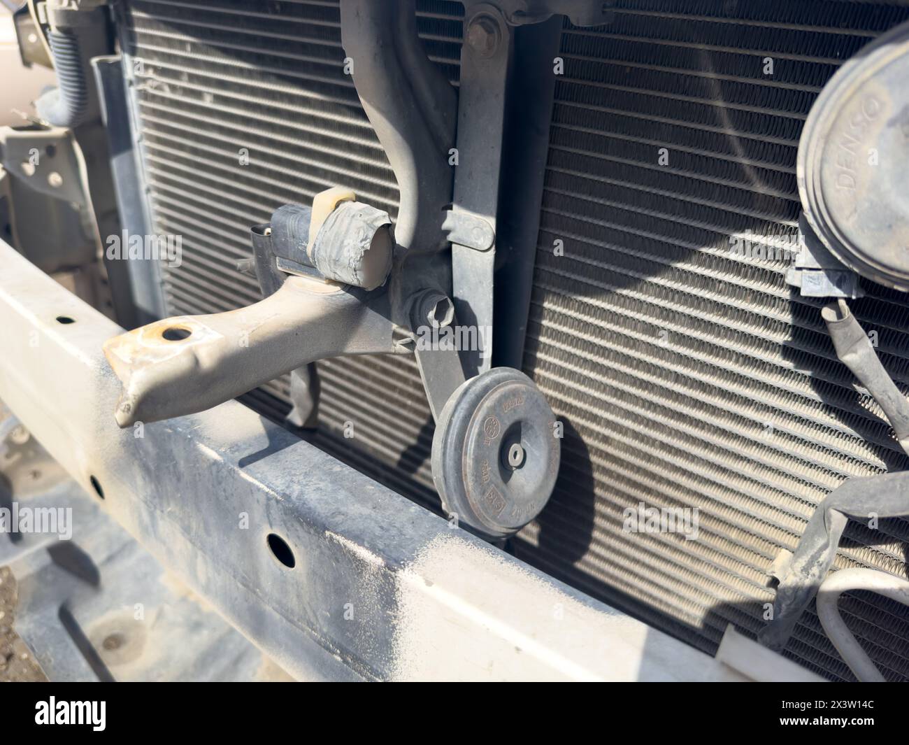 Front airbag crash impact sensor exposed after removal of front bumper ...