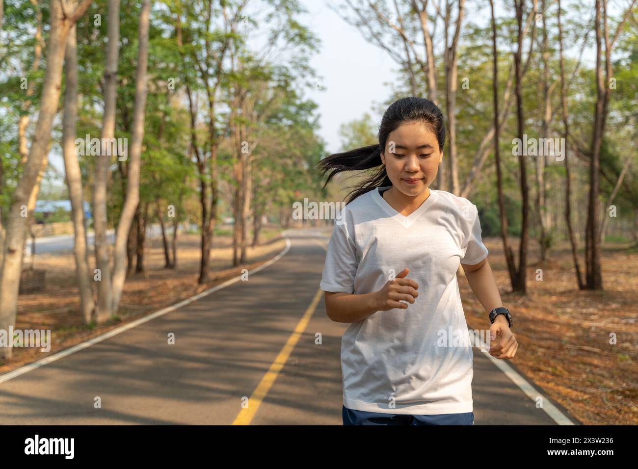 Sporty young sisters running hi-res stock photography and images - Alamy