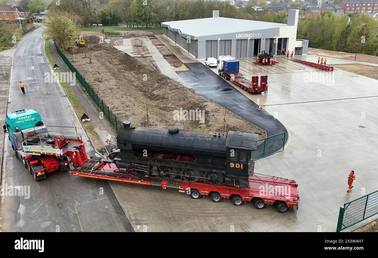 EDITORIAL USE ONLY Aerial views of the Q7 locomotive as it is moved ...